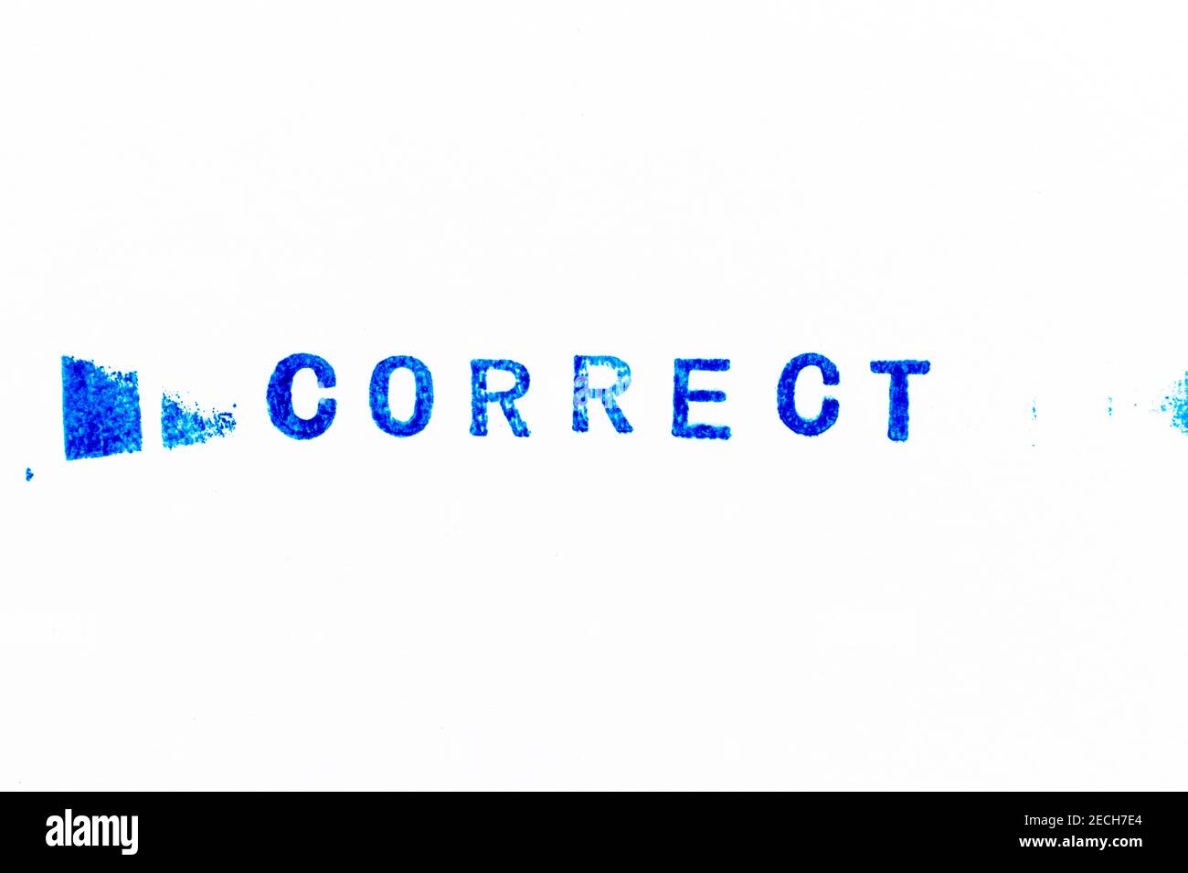 Blue color ink of rubber stamp in word correct on white paper ...
