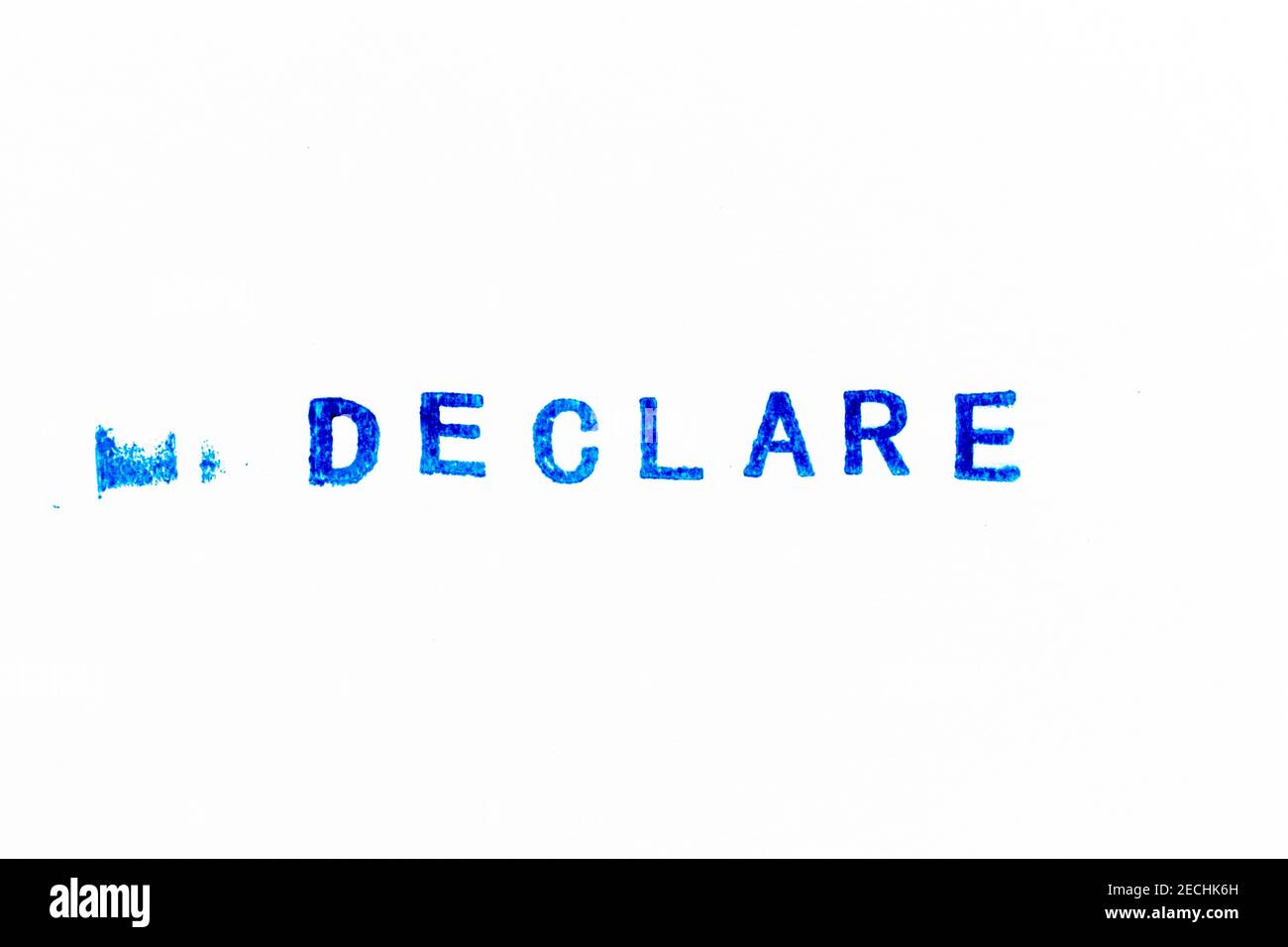 Blue color ink of rubber stamp in word declare on white paper ...