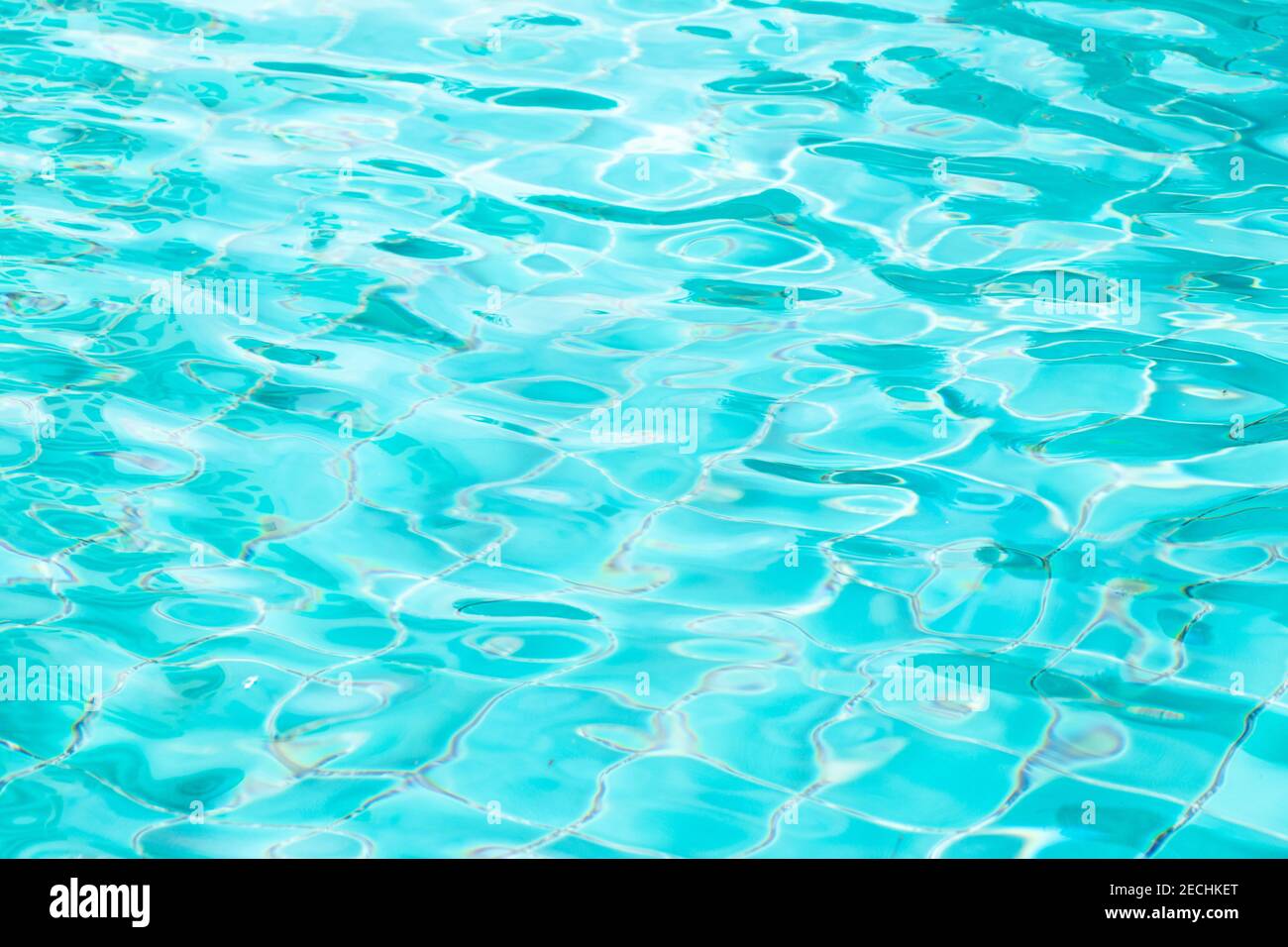 Ripple Water in swimming pool with blue tile floor background Stock ...