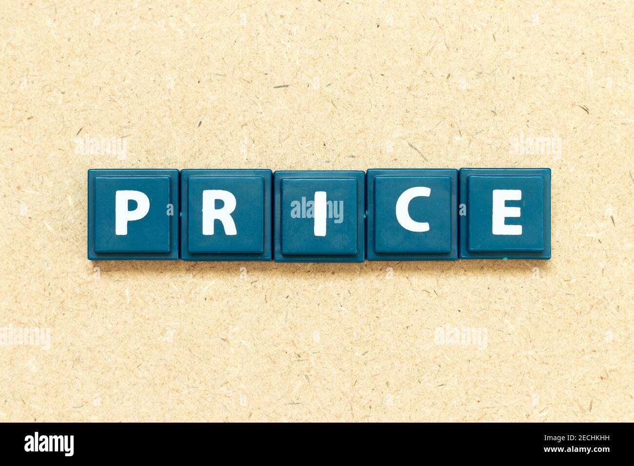 Tile alphabet letter in word price on wood background Stock Photo - Alamy