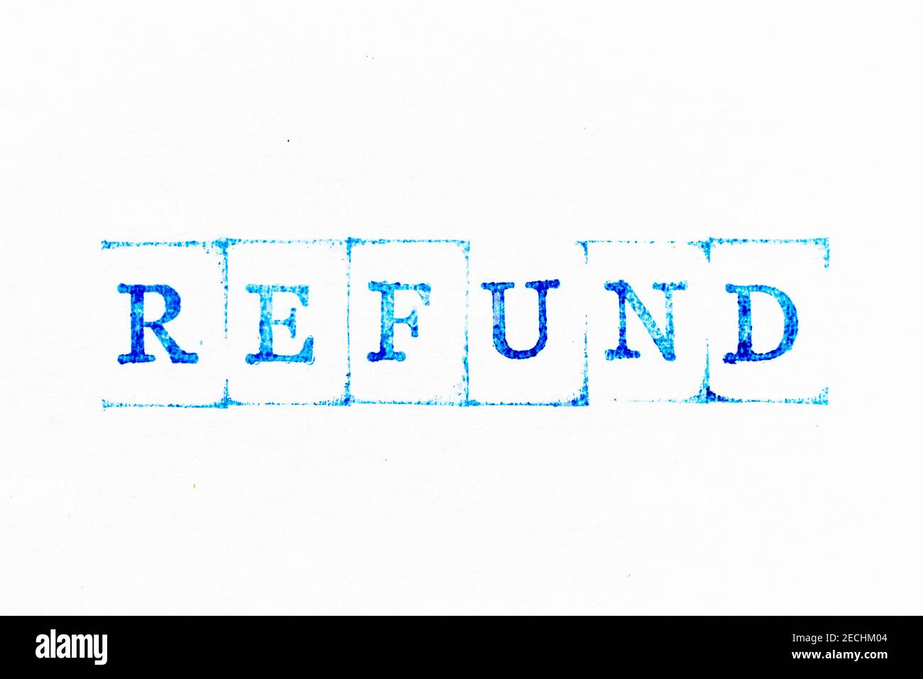 Blue color ink rubber stamp in word refund on white paper background ...