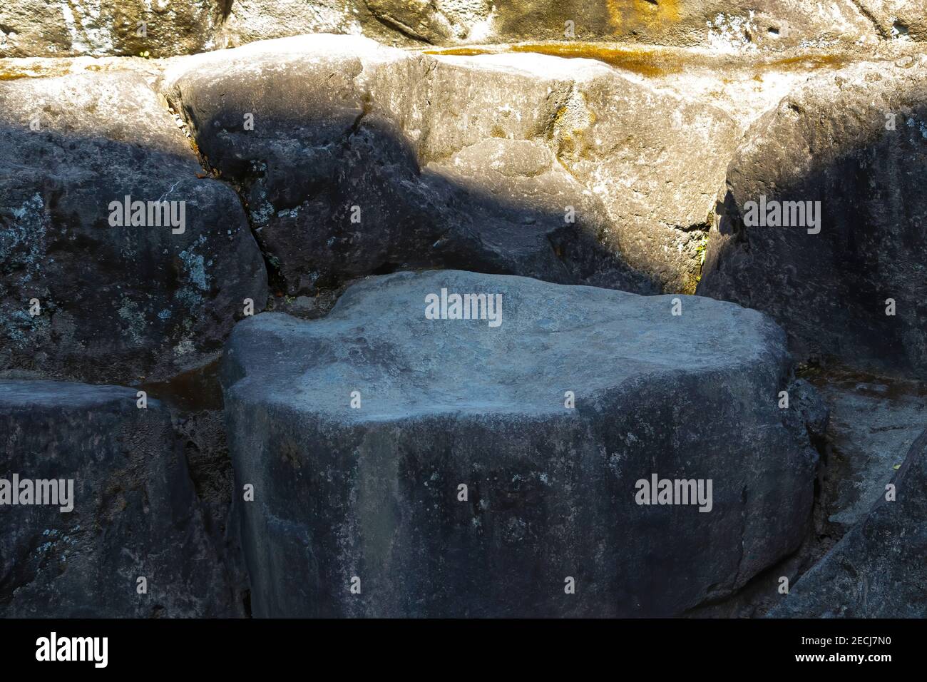 Natural rocks form stepping stones to go either up or down, in the ...
