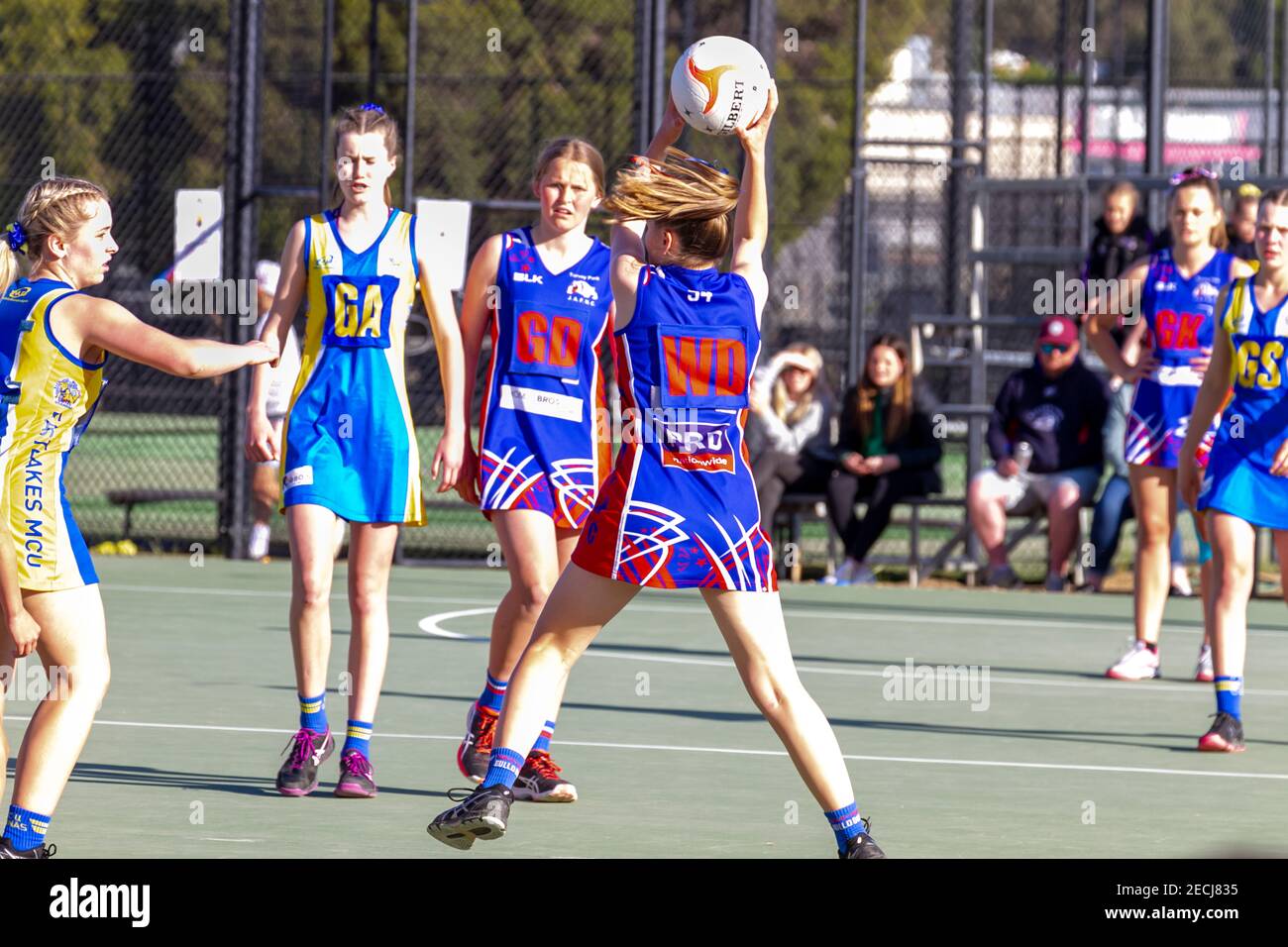 Teenage girls playing netball Stock Photo - Alamy