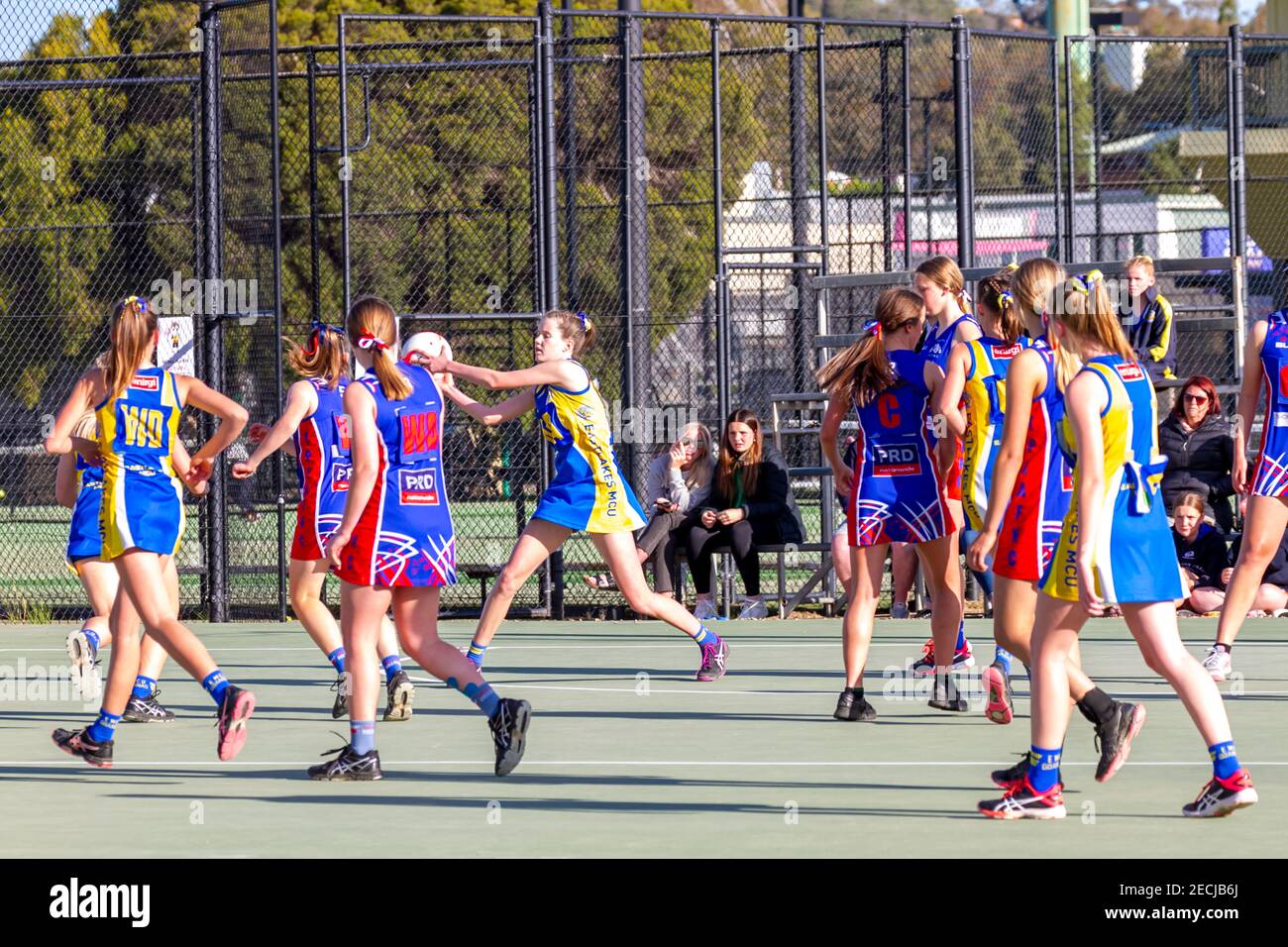 Teenage girls playing netball Stock Photo - Alamy