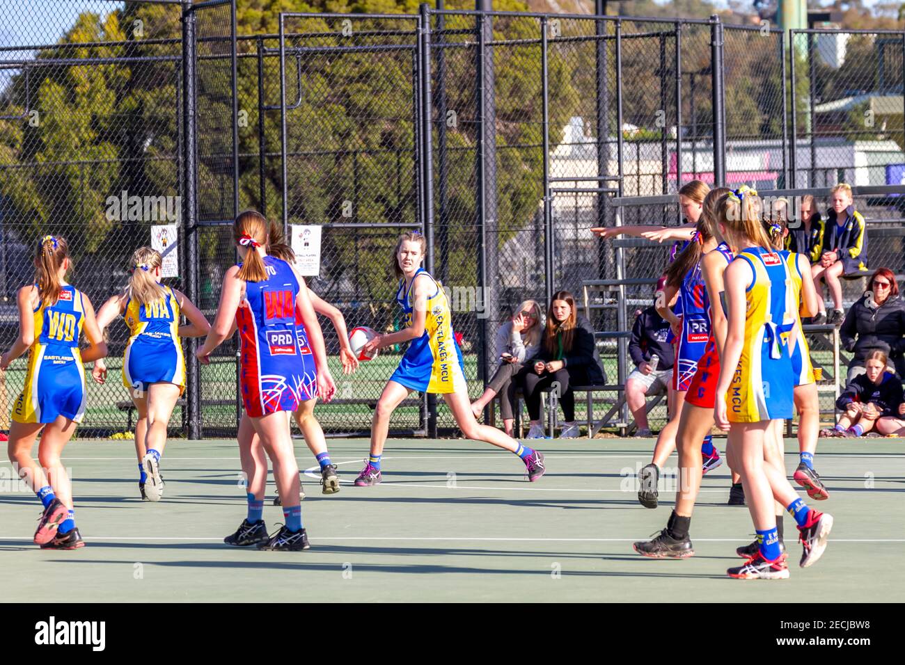 Teenage girls playing netball Stock Photo - Alamy