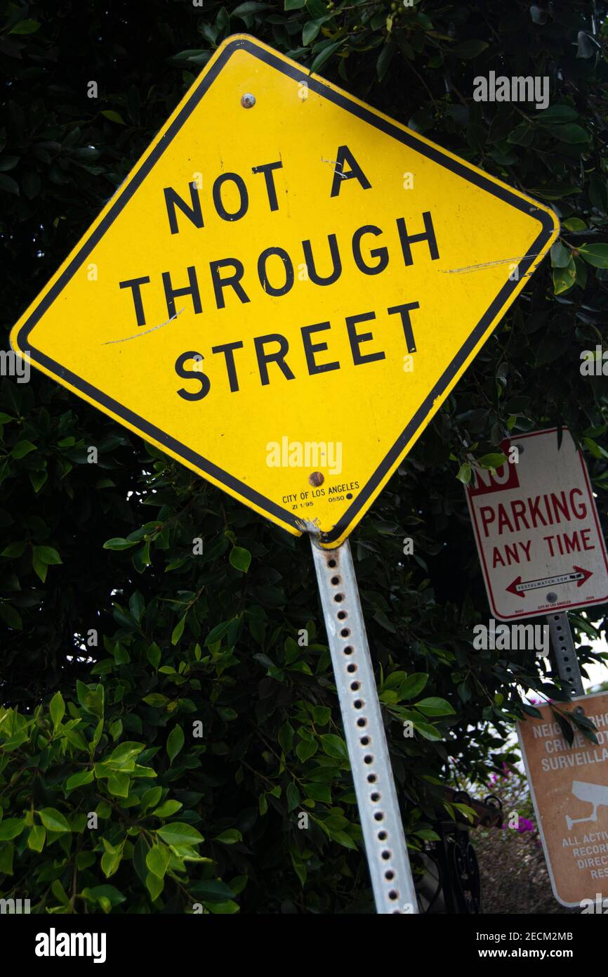 A sign that says, "Not a Through Street," which means that there is no ...