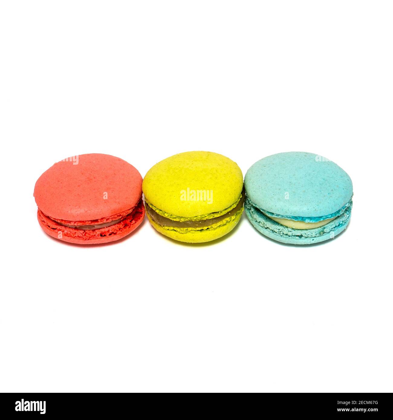 Red Yellow Blue Macaroons isolated in white background. Colorful french ...
