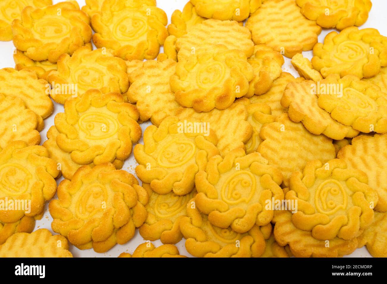 Lots of shortbread cookies scattered isolated on white background ...