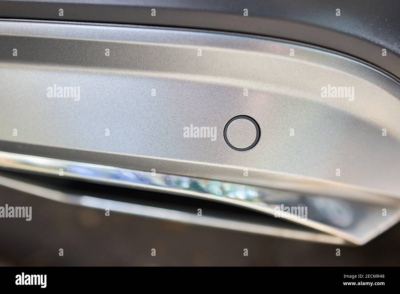 Selective focus on bumper right side parking sensor at back of ...