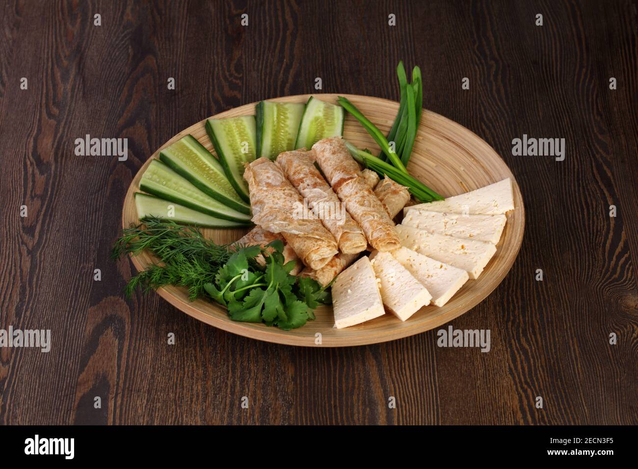 Chanakh cheese with herbs and vegetables Stock Photo - Alamy