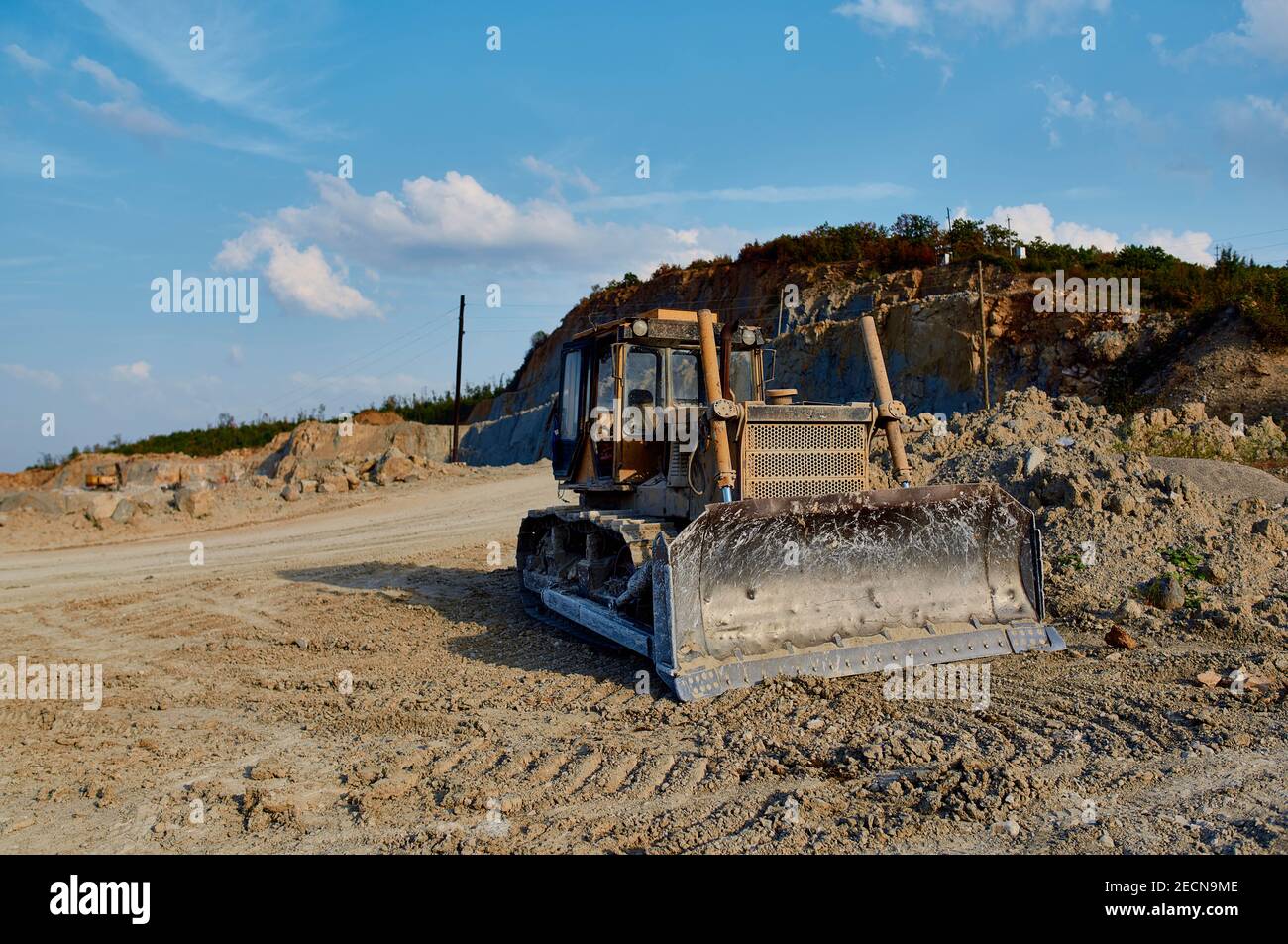 large bulldozer digging earth gravel and geology vehicle Stock Photo ...