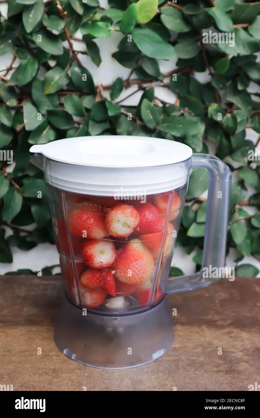 fresh strawberry , strawberry in the blender Stock Photo - Alamy