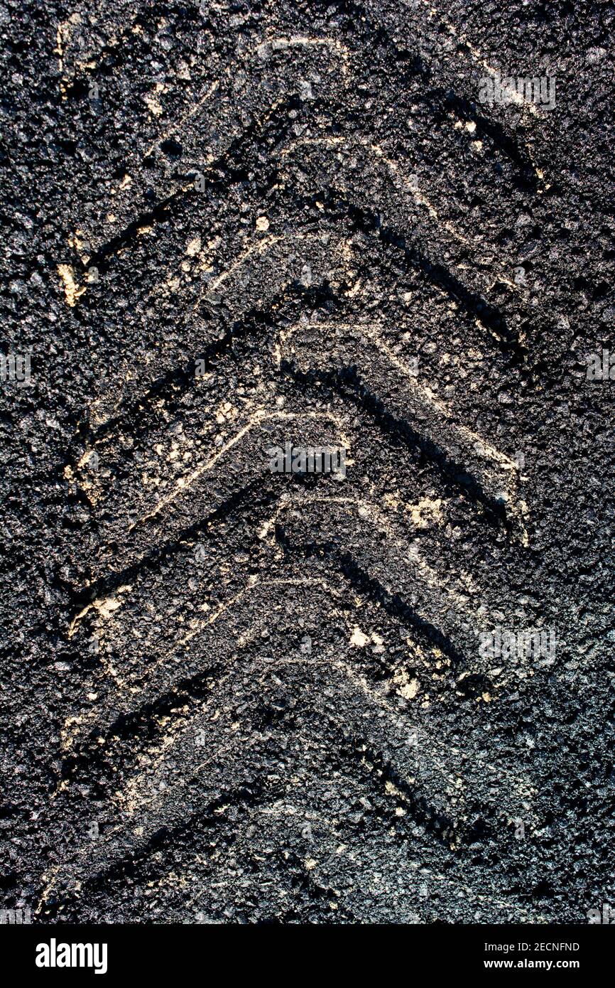 A vertical shot of tire tracks on the ground Stock Photo - Alamy