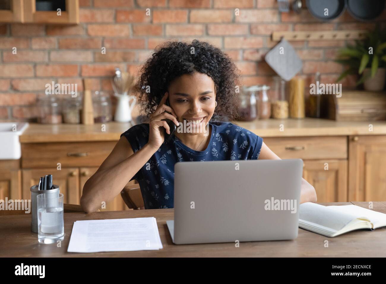 African american woman talking smiling hi-res stock photography and ...