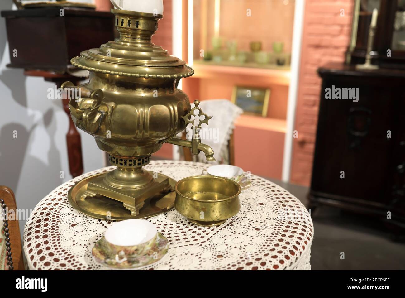Copper samovar on round table in restaurant Stock Photo - Alamy