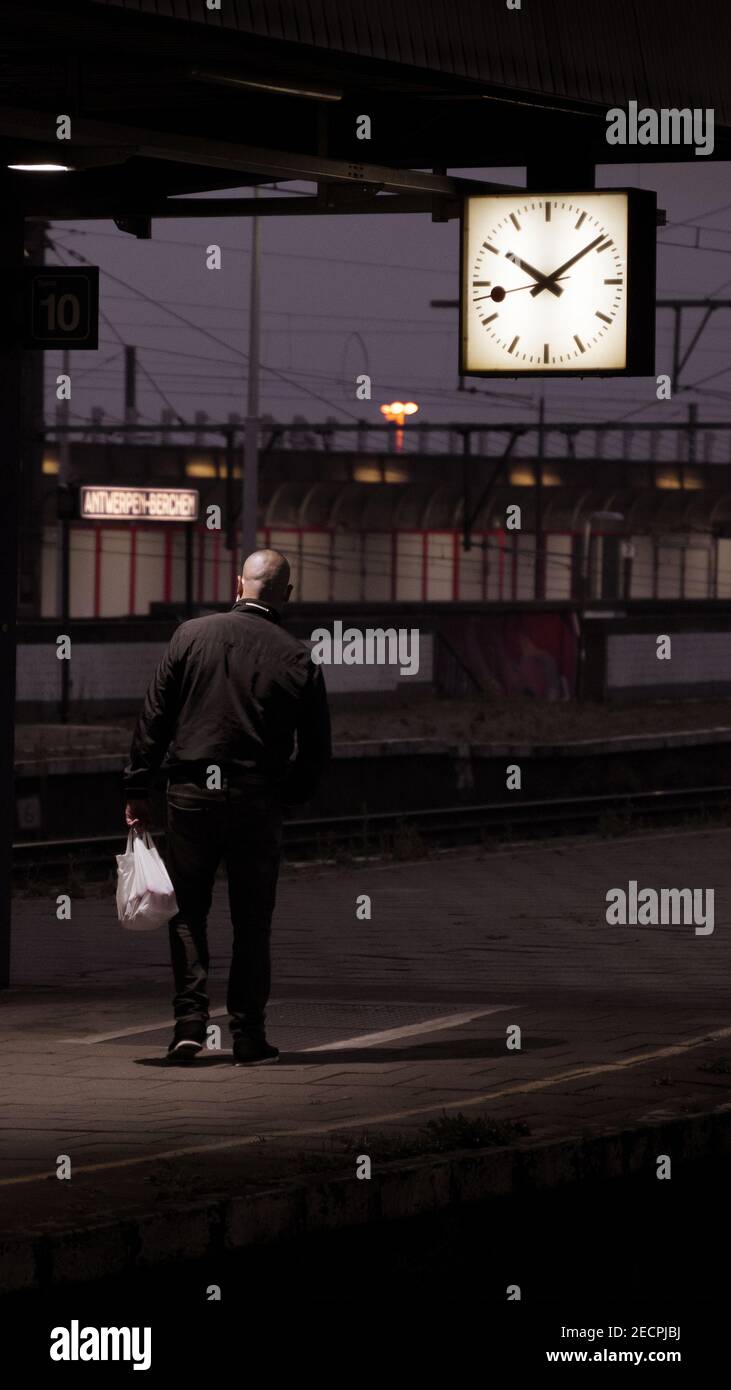 Waiting Under Clock High Resolution Stock Photography and Images - Alamy