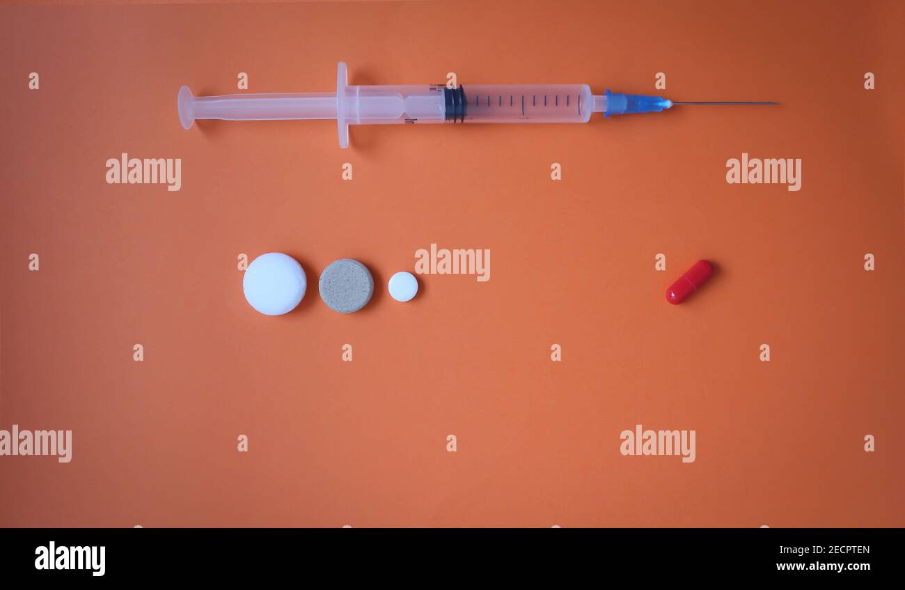 Tablets syringe medicine hi-res stock photography and images - Alamy