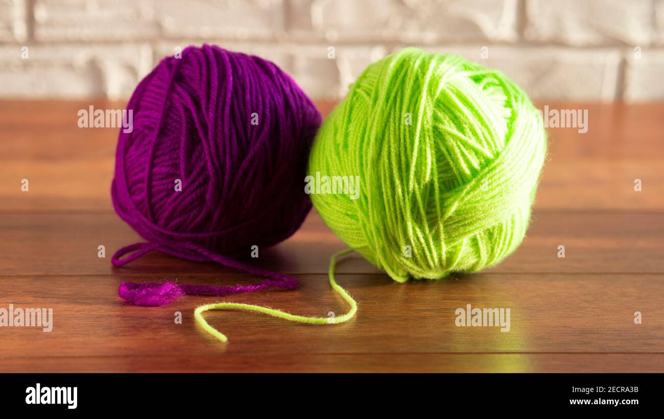 Clew of green thread for knitting isolated on white background Stock ...