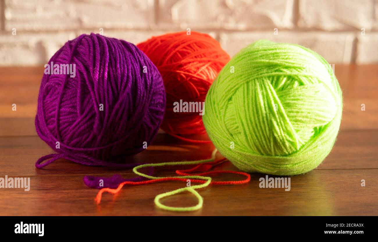 Clew of green thread for knitting isolated on white background Stock ...