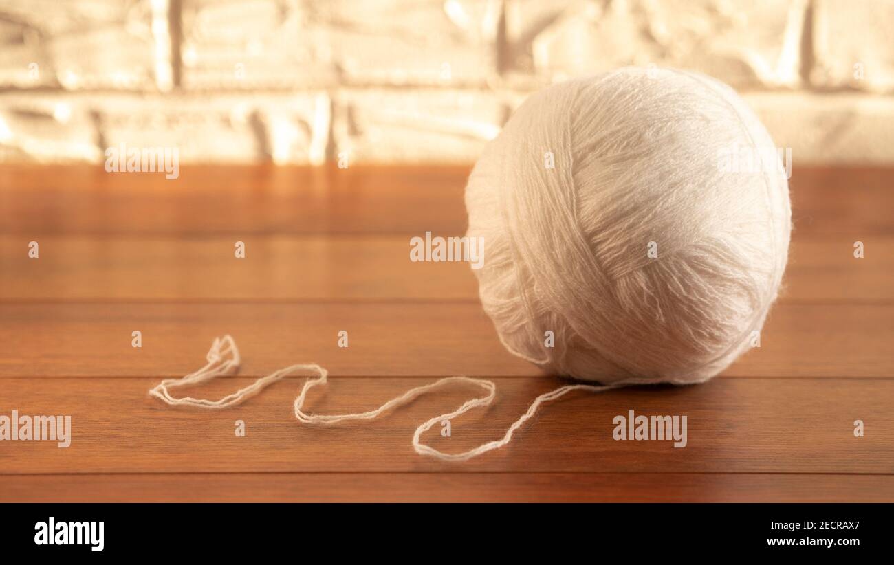 Clew of green thread for knitting isolated on white background Stock ...