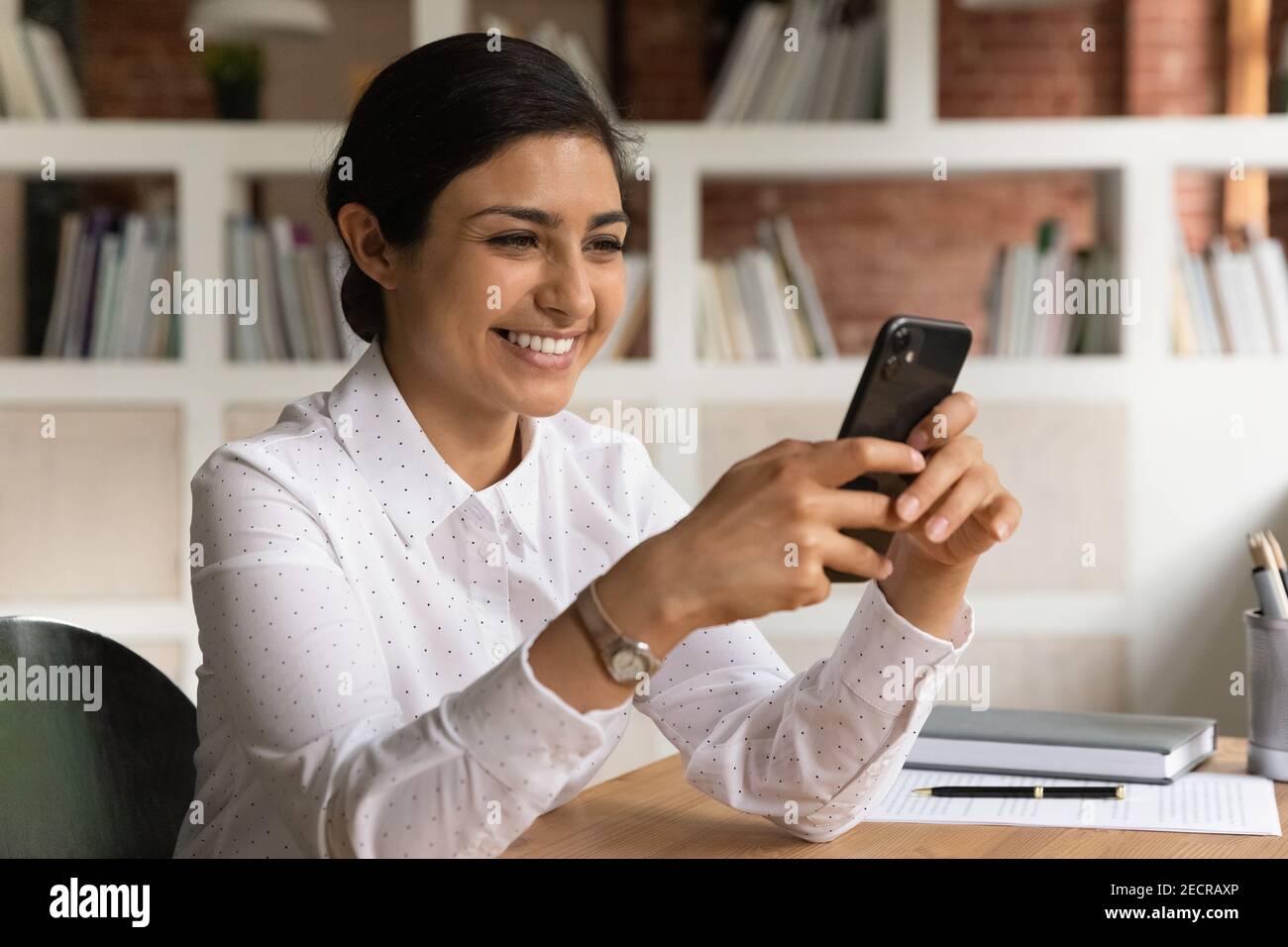 Indian woman talking on video hi-res stock photography and images - Alamy