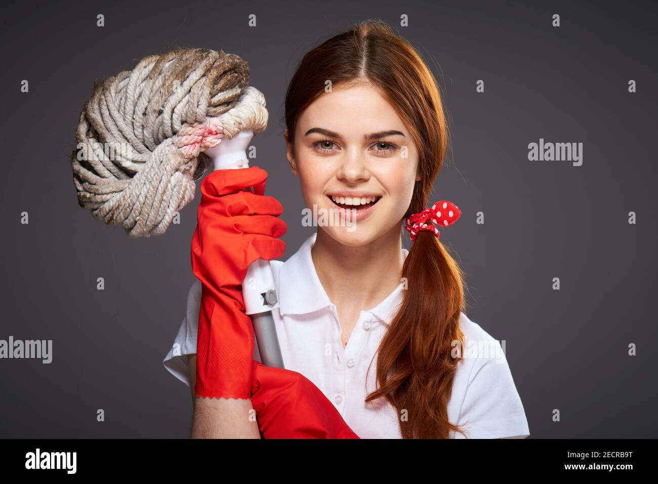 cheerful cleaning lady in hand emotion service Stock Photo - Alamy