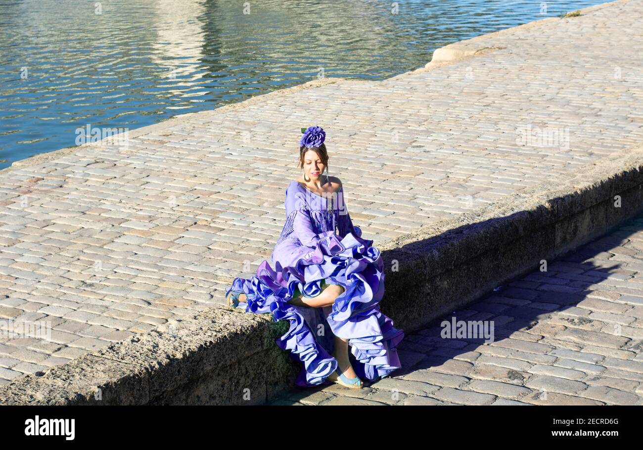 the girl in the purple flamenco dress Stock Photo - Alamy