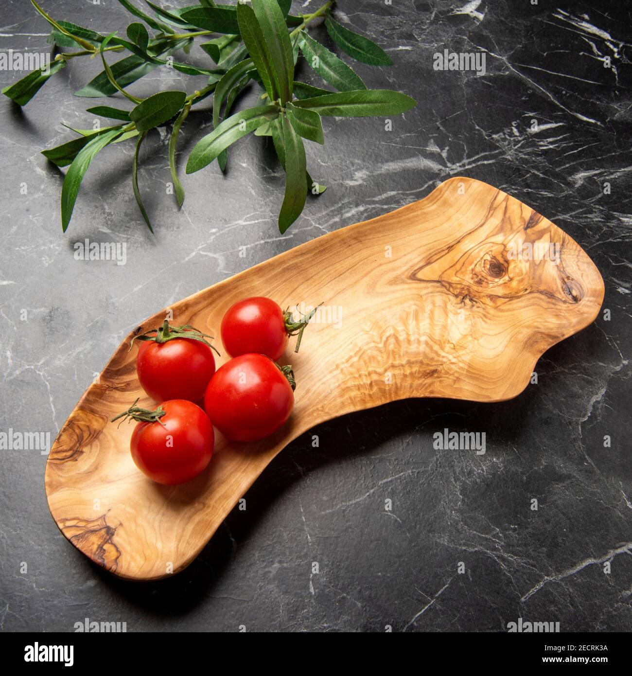 hand carved wooden snack board on the table Stock Photo - Alamy