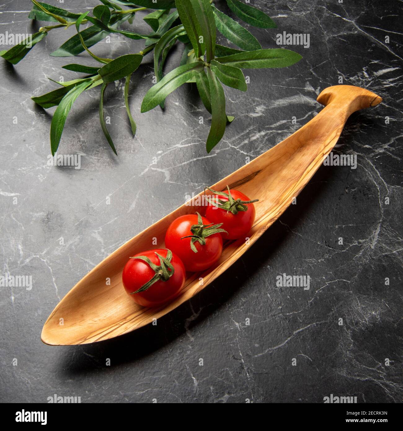 hand carved wooden snack board on the table Stock Photo - Alamy