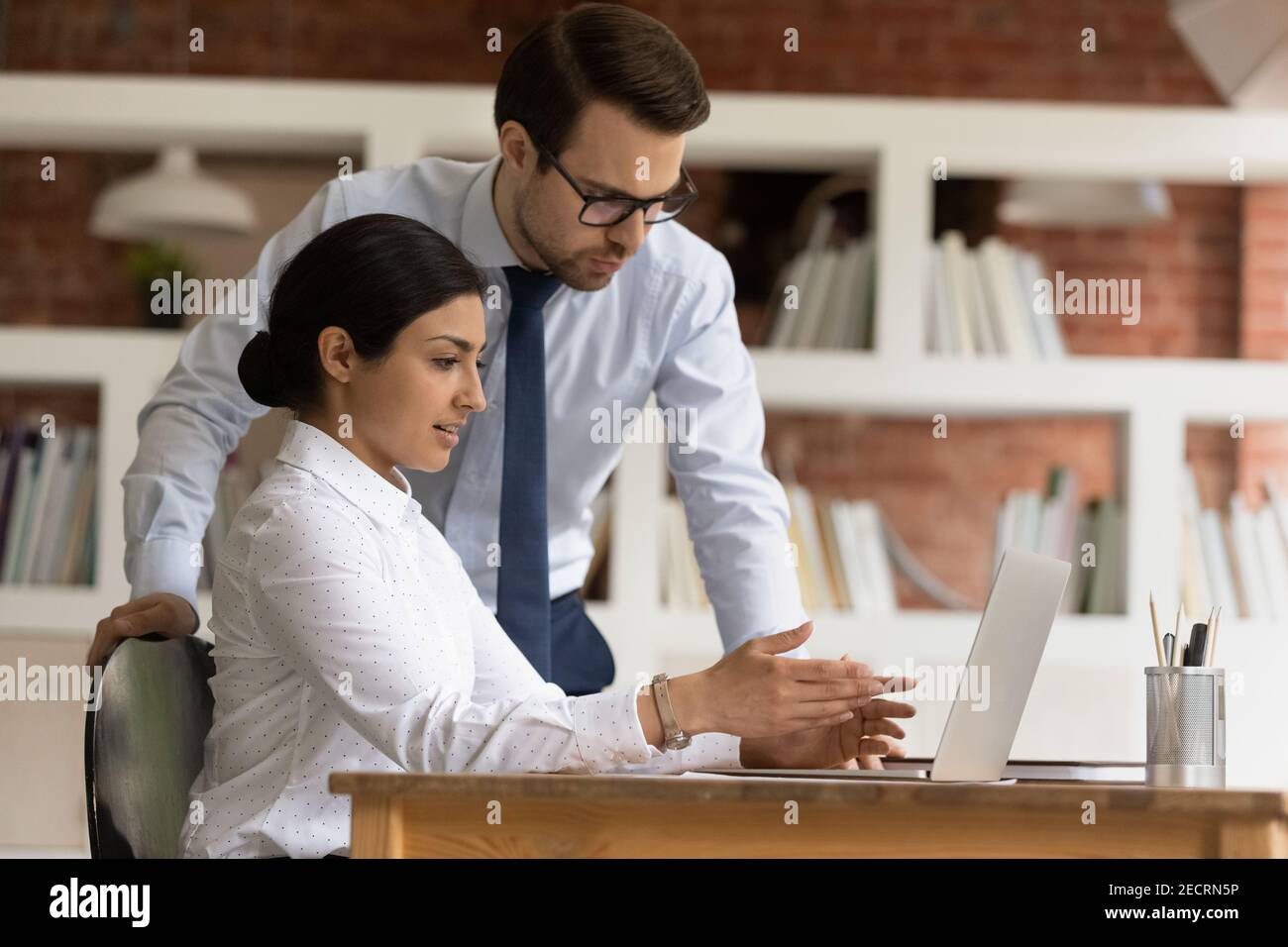 Multiethnic diverse colleagues work on computer in office Stock Photo ...