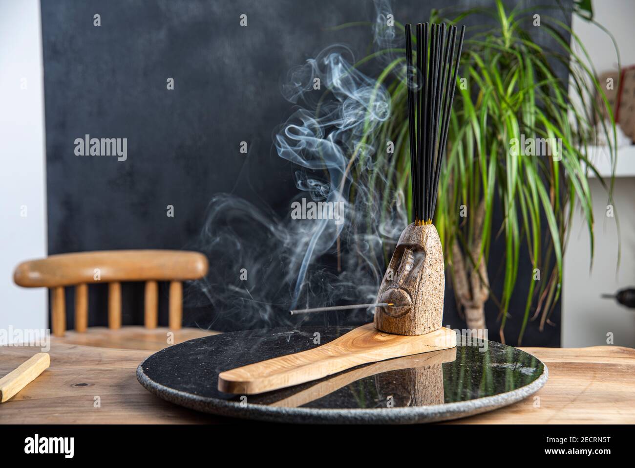 incense on stone stand with smoke Stock Photo - Alamy