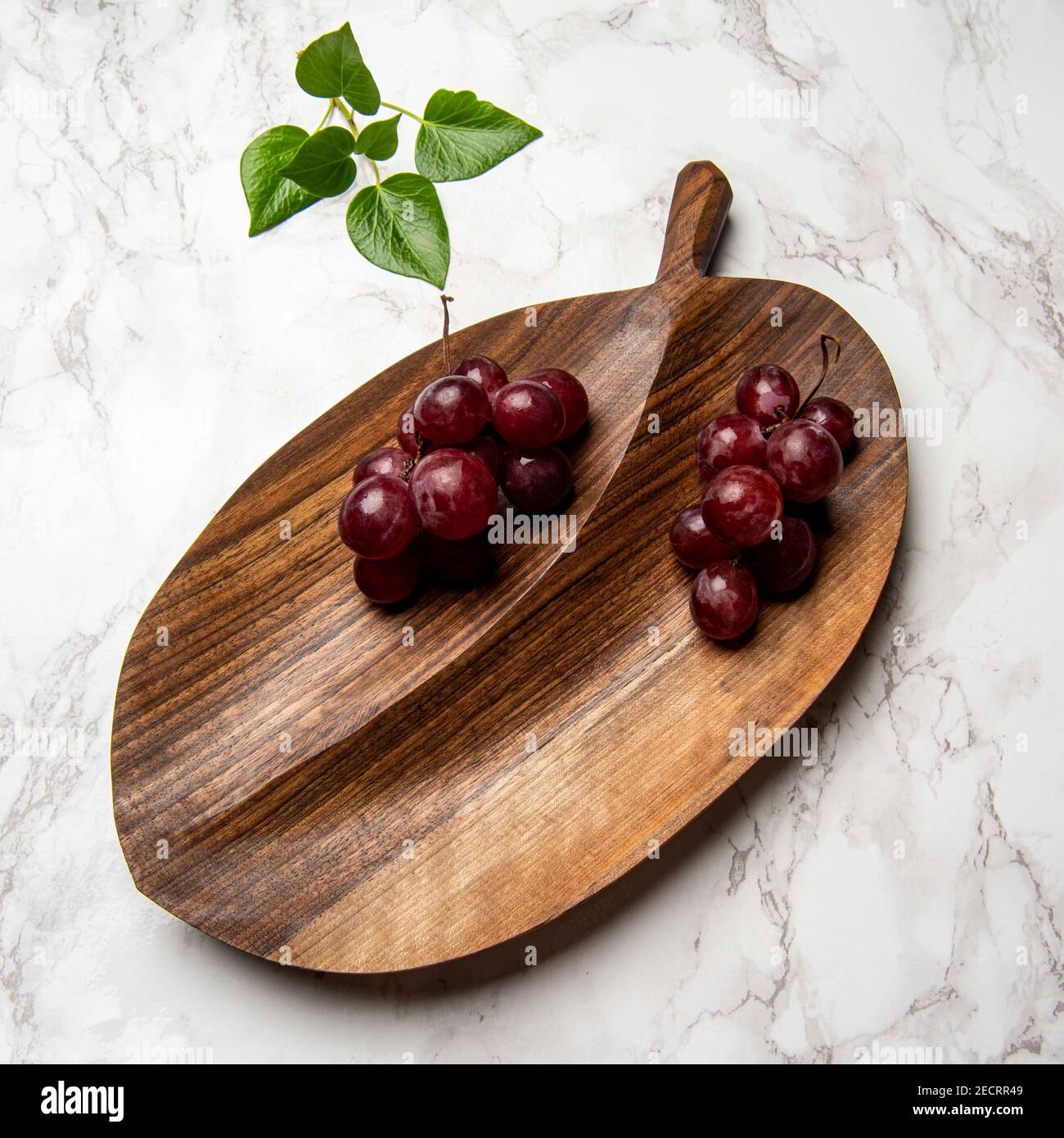 hand carved wooden snack board Stock Photo - Alamy
