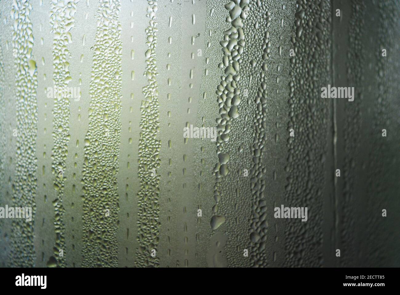 Transparent glass steamed with steam, condensation of water and small ...