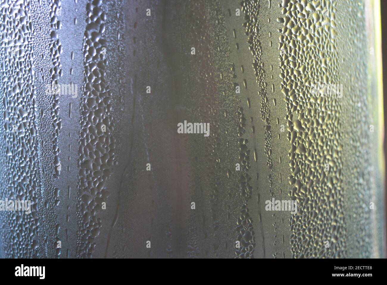 Transparent glass steamed with steam, condensation of water and small ...