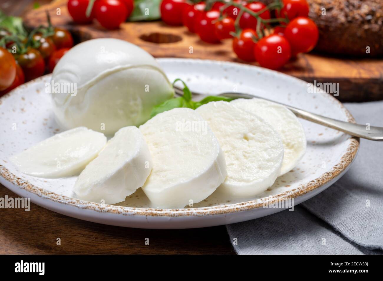 Cheese collection, eating of white soft Italian cheese mozzarella ...