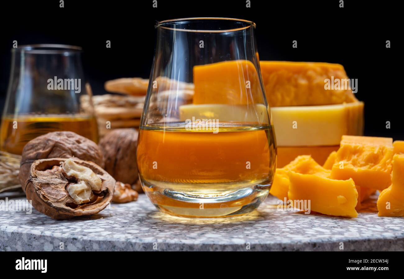 Cheese collection, orange and yellow smoked British cheese from England ...