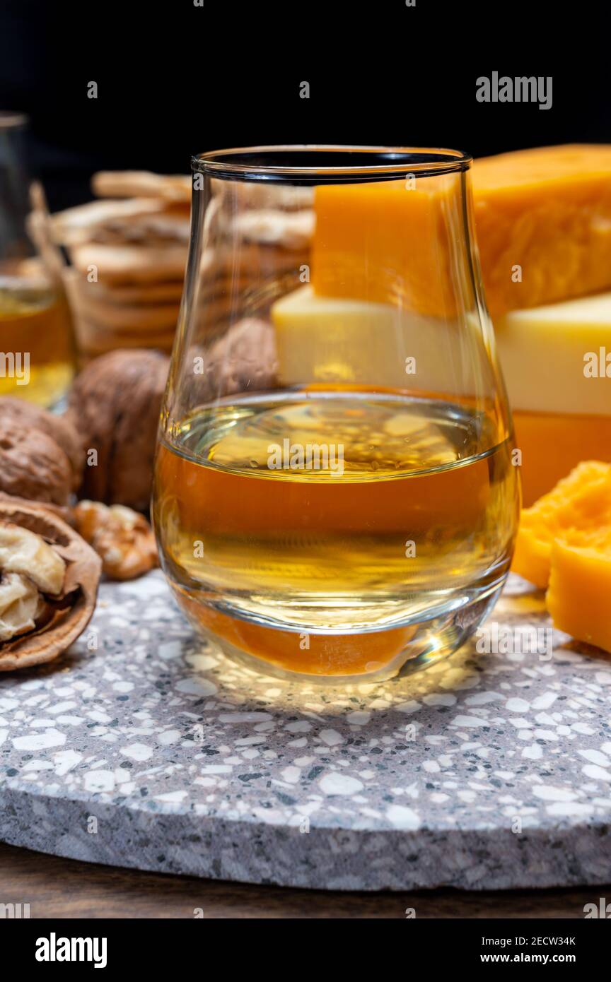 Cheese collection, orange and yellow smoked British cheese from England ...