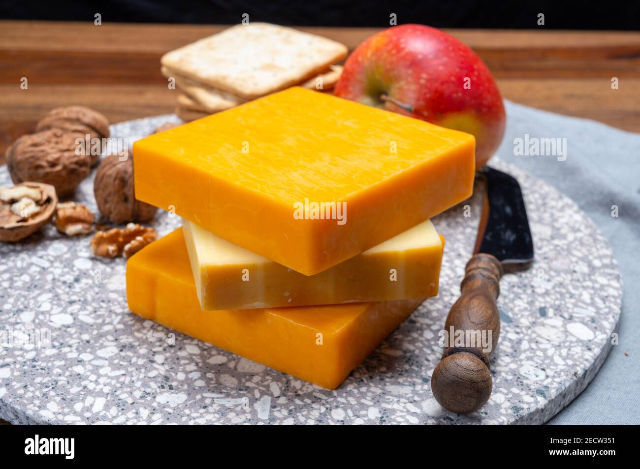 Cheese collection, orange and yellow smoked British cheese from England ...