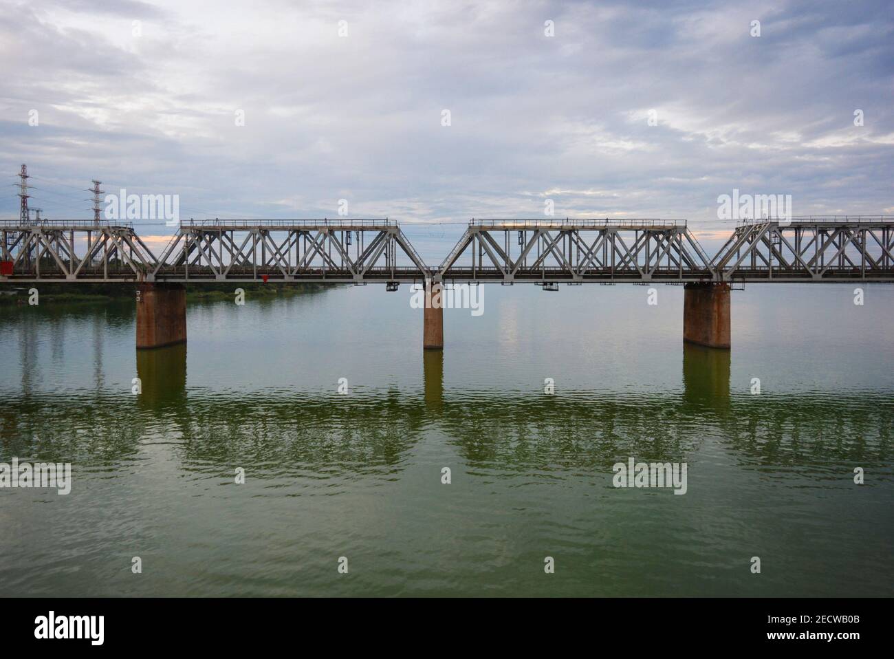 The gray Samara railway bridge over the surface of the Samara river ...