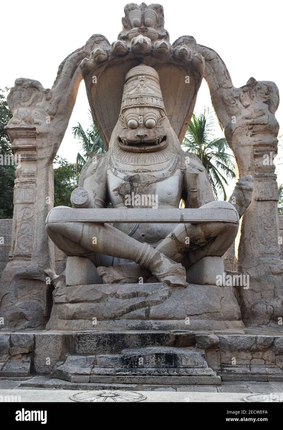 stone carved statute of the Hindu god Vishnu in his Narsimha avatar ...