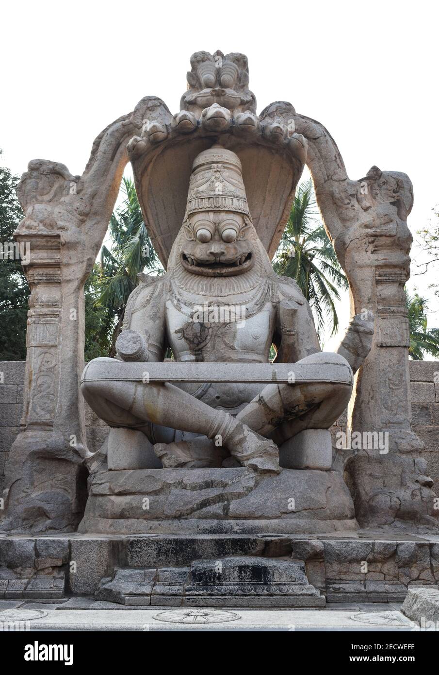 stone carved statute of the Hindu god Vishnu in his Narsimha avatar ...