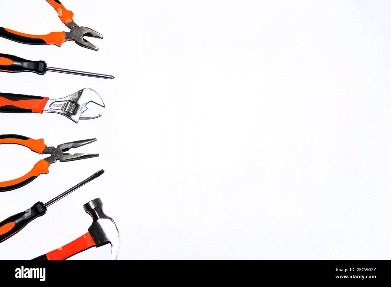 Group of used mechanical tools on a white background. With place for ...