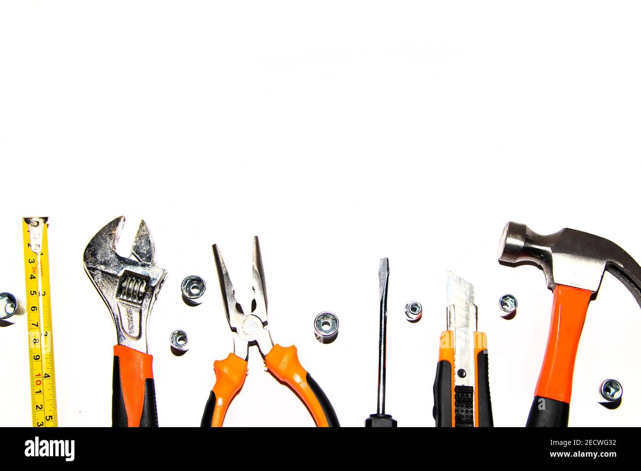 Group of used mechanical tools on a white background. With place for ...