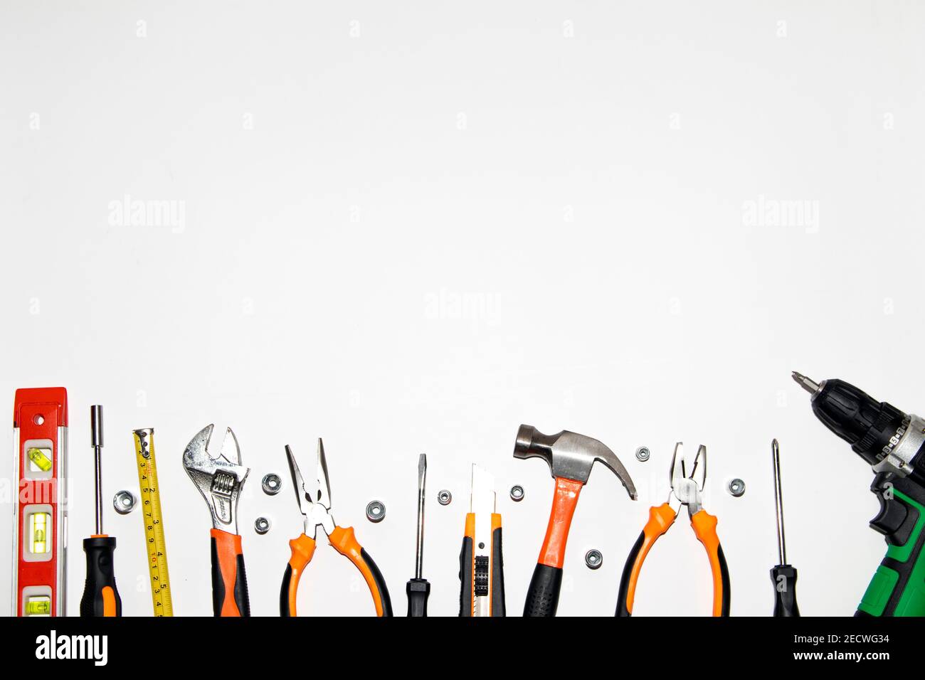 Group of used mechanical tools on a white background. With place for ...