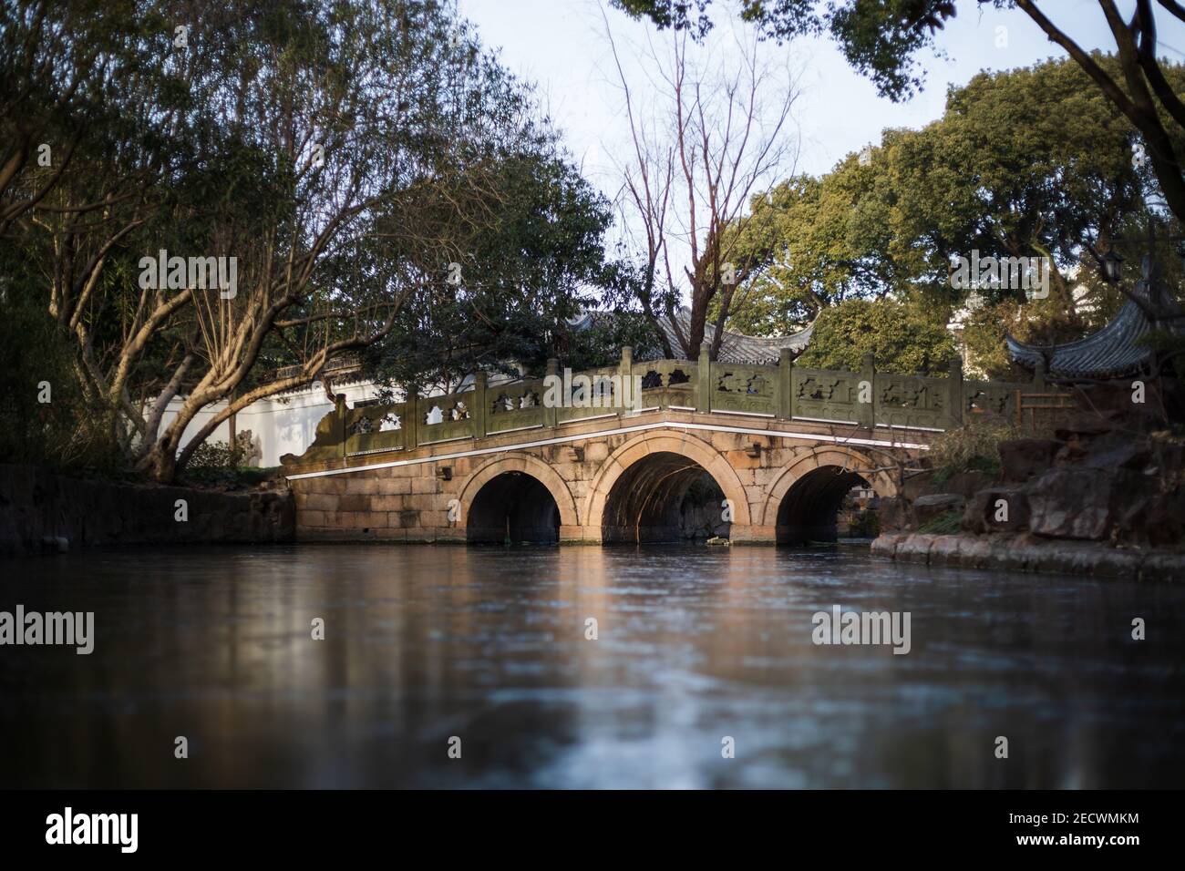 Stone bridge over pond in hi-res stock photography and images - Alamy