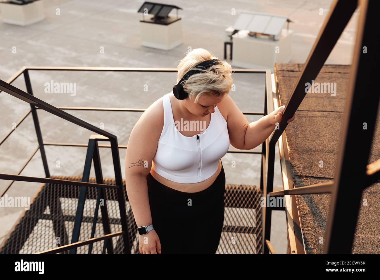 Plus size woman standing in hi-res stock photography and images - Alamy