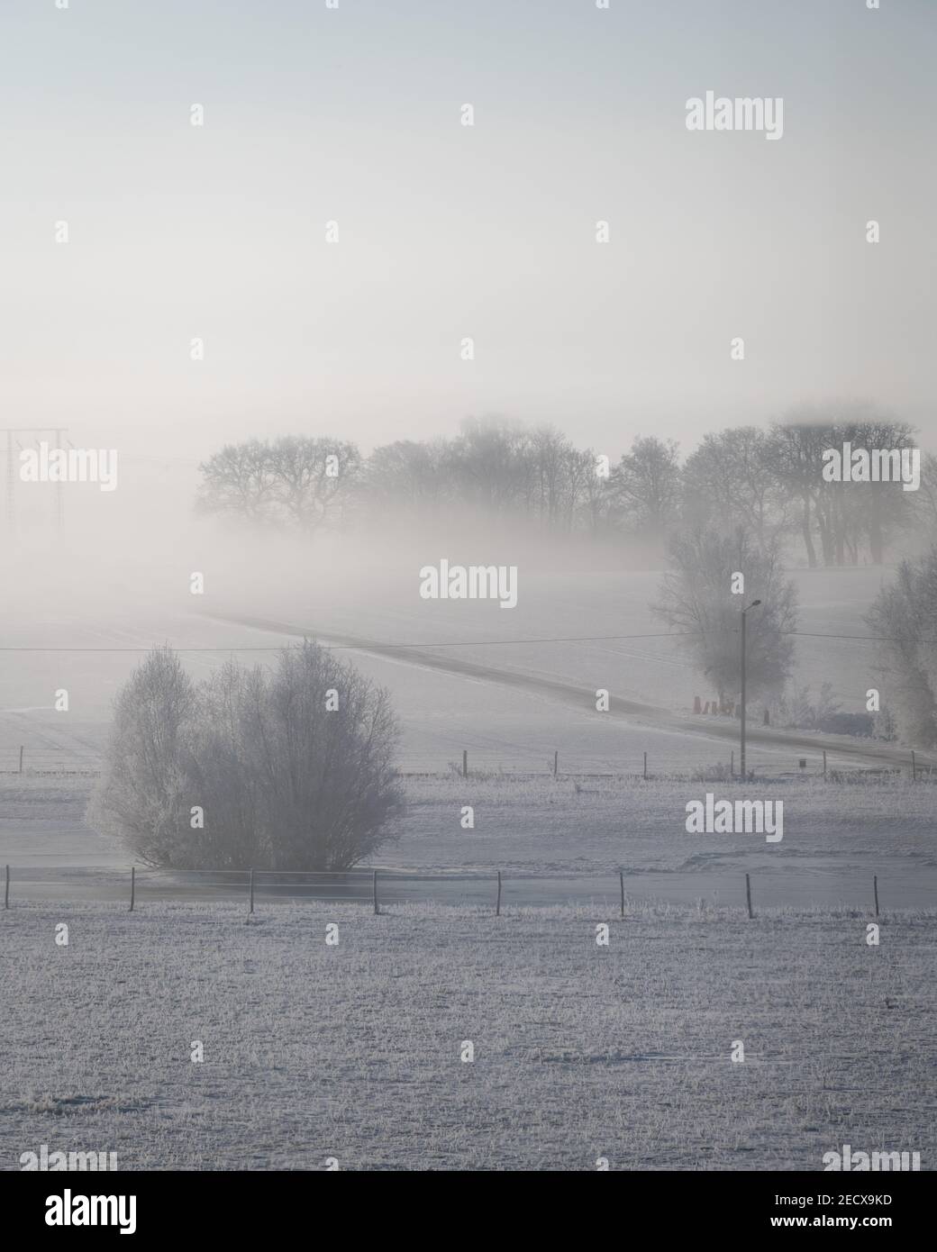 Cold snowy rural winter landscape scene in Skåne Sweden Stock Photo - Alamy