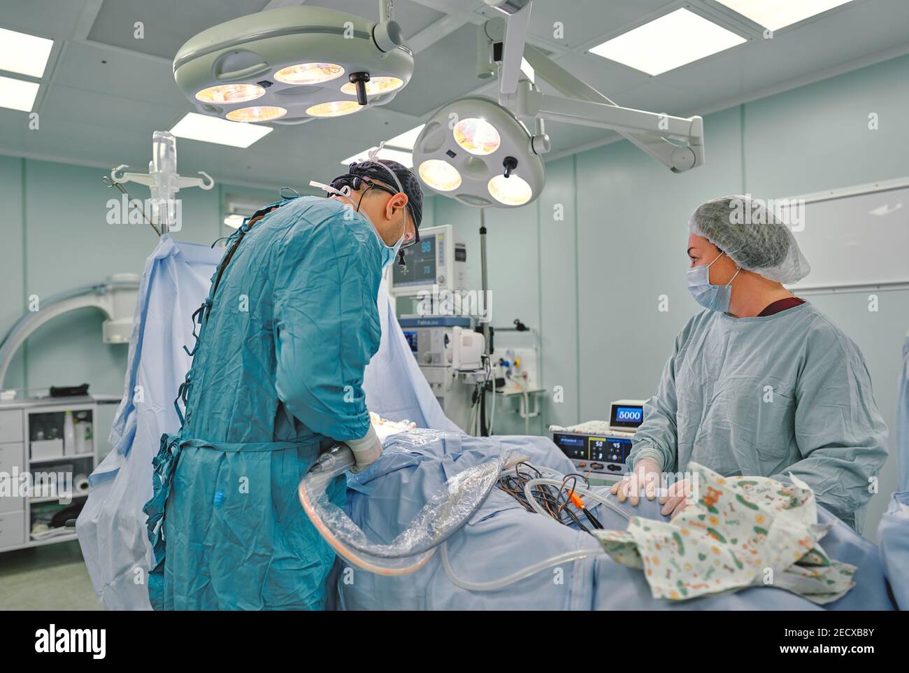 surgeon during liposuction in the operating room Stock Photo - Alamy