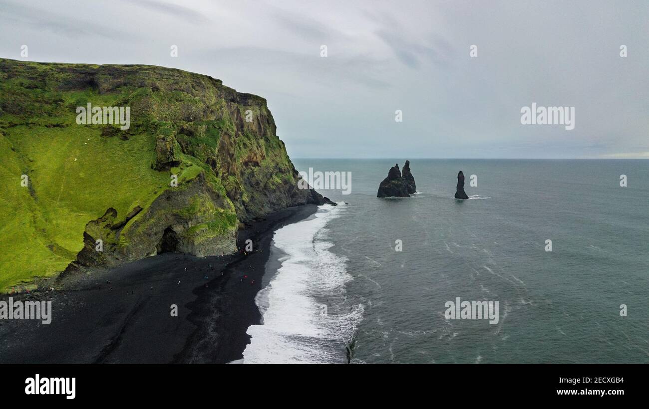 Aerial panoramic view of Halsanefshellir Cave at Reynisfjara black ...