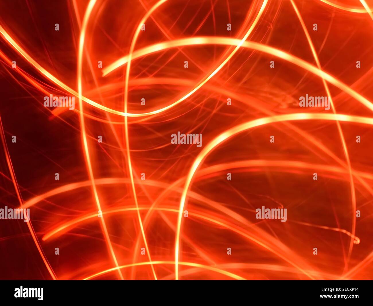Abstract background of red neon glowing light shapes. Bright stripes ...